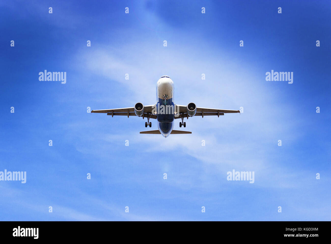Plane flying through clouds in the sky. Jet aircraft in the air Stock ...
