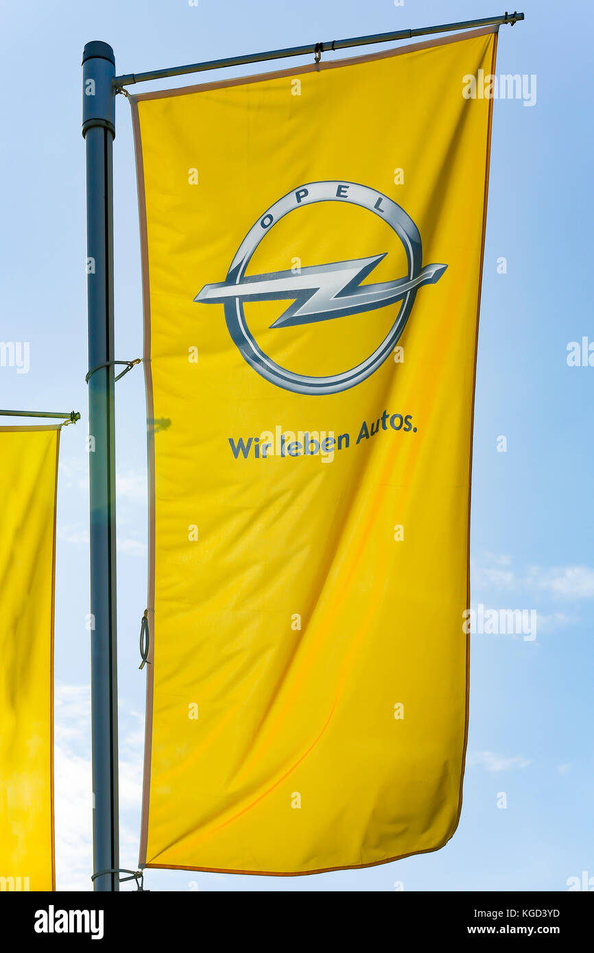 WETZLAR, GERMANY JULY, 2017: OPEL Logo on a Flag.OPEl AG is a German ...