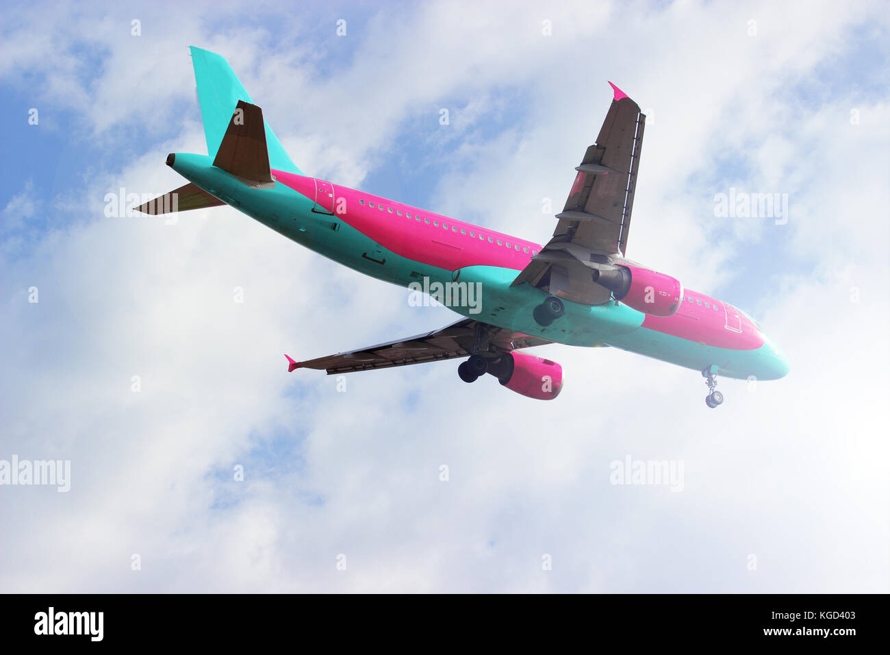 Plane flying through clouds in the sky. Jet aircraft in the air Stock ...