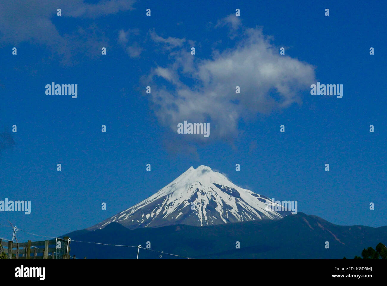 Mt Taranaki in spring snow Stock Photo - Alamy
