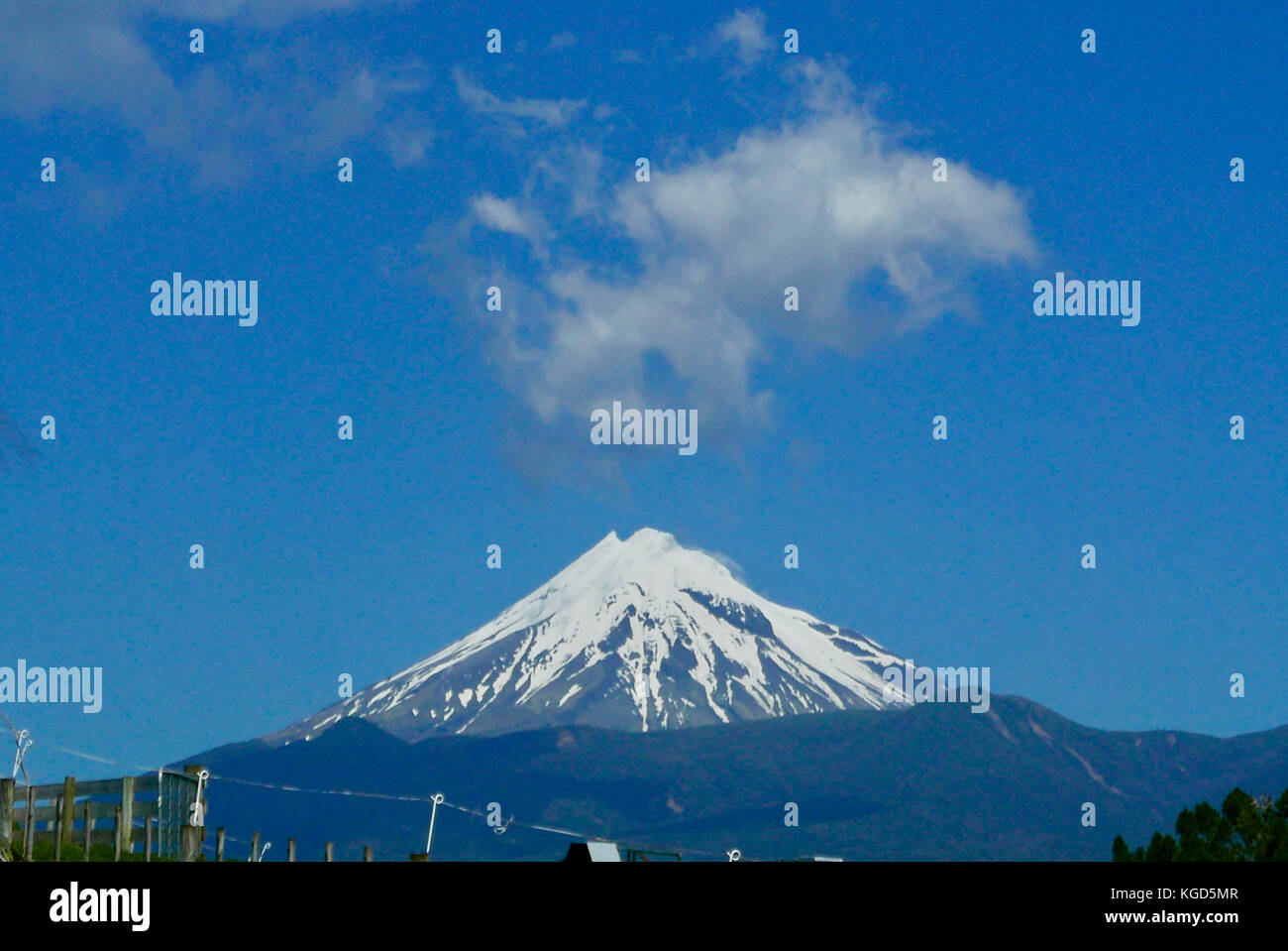 Mt Taranaki in spring snow Stock Photo - Alamy