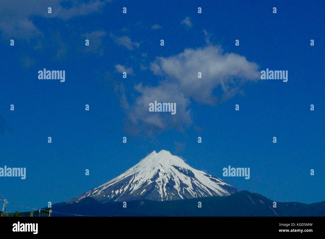 Mt Taranaki in spring snow Stock Photo - Alamy