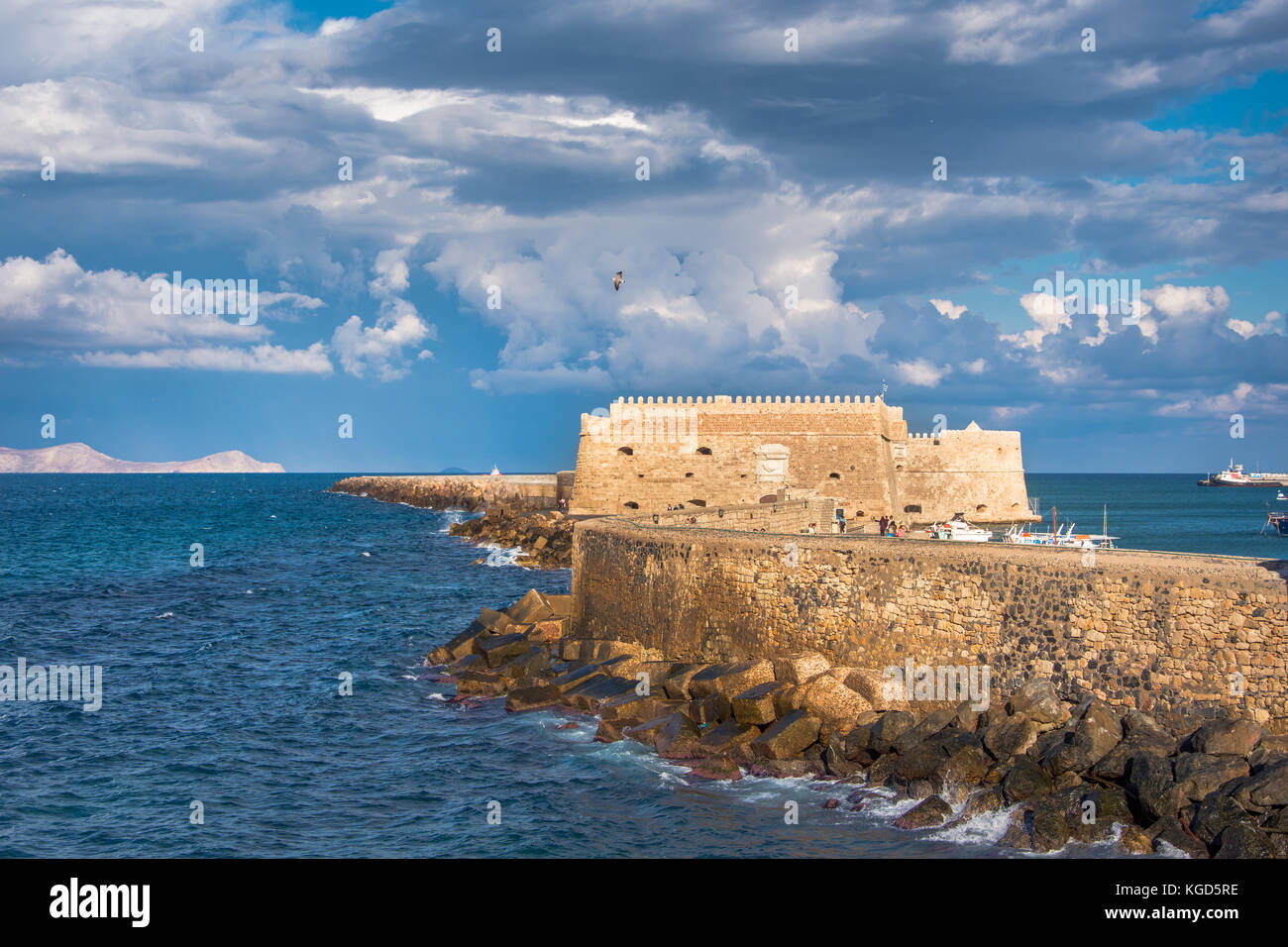 Heraklion harbour with old venetian fort Koule and shipyards, Crete ...