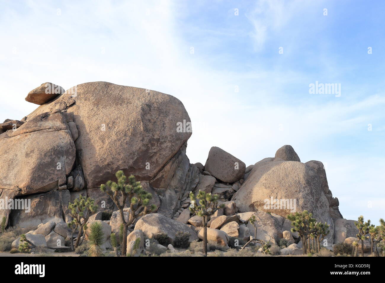 Balancing rock on top of huge rock formation at Joshua tree national ...