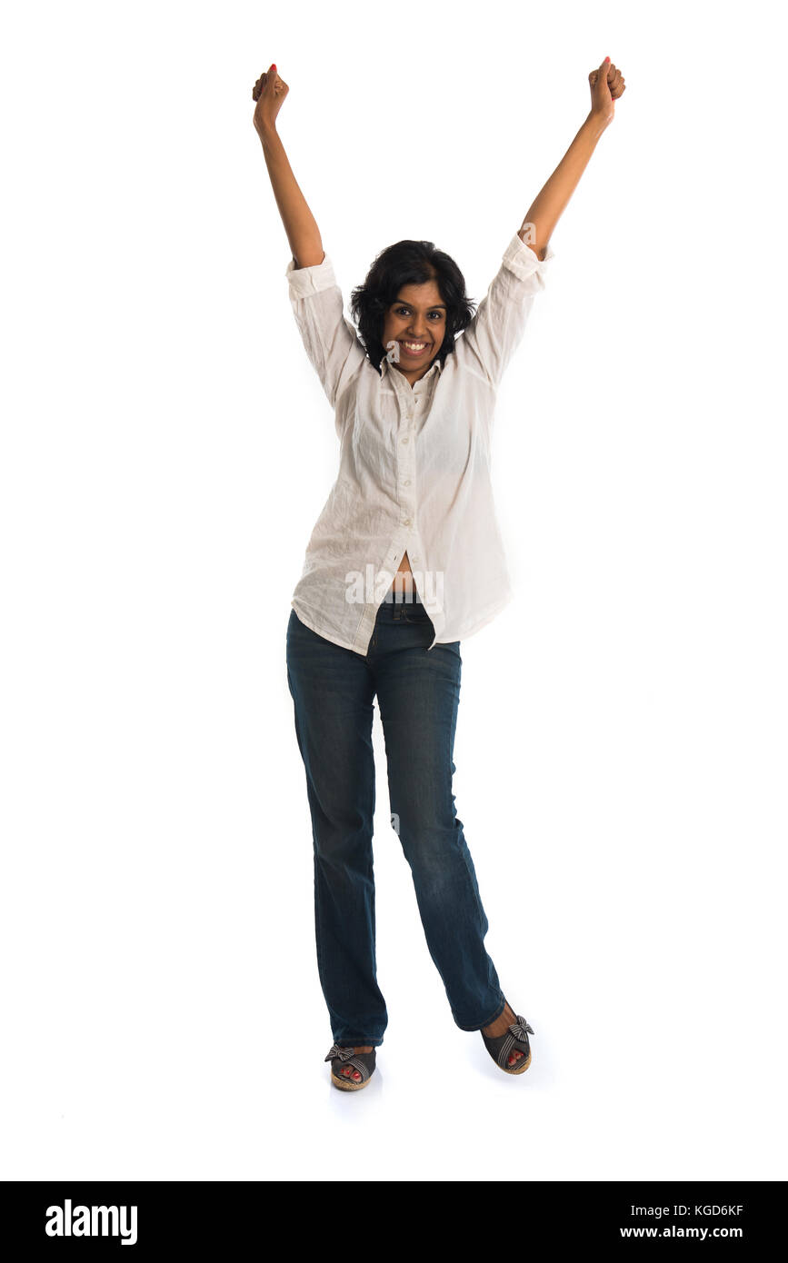 casual indian female celebrating in joy Stock Photo - Alamy