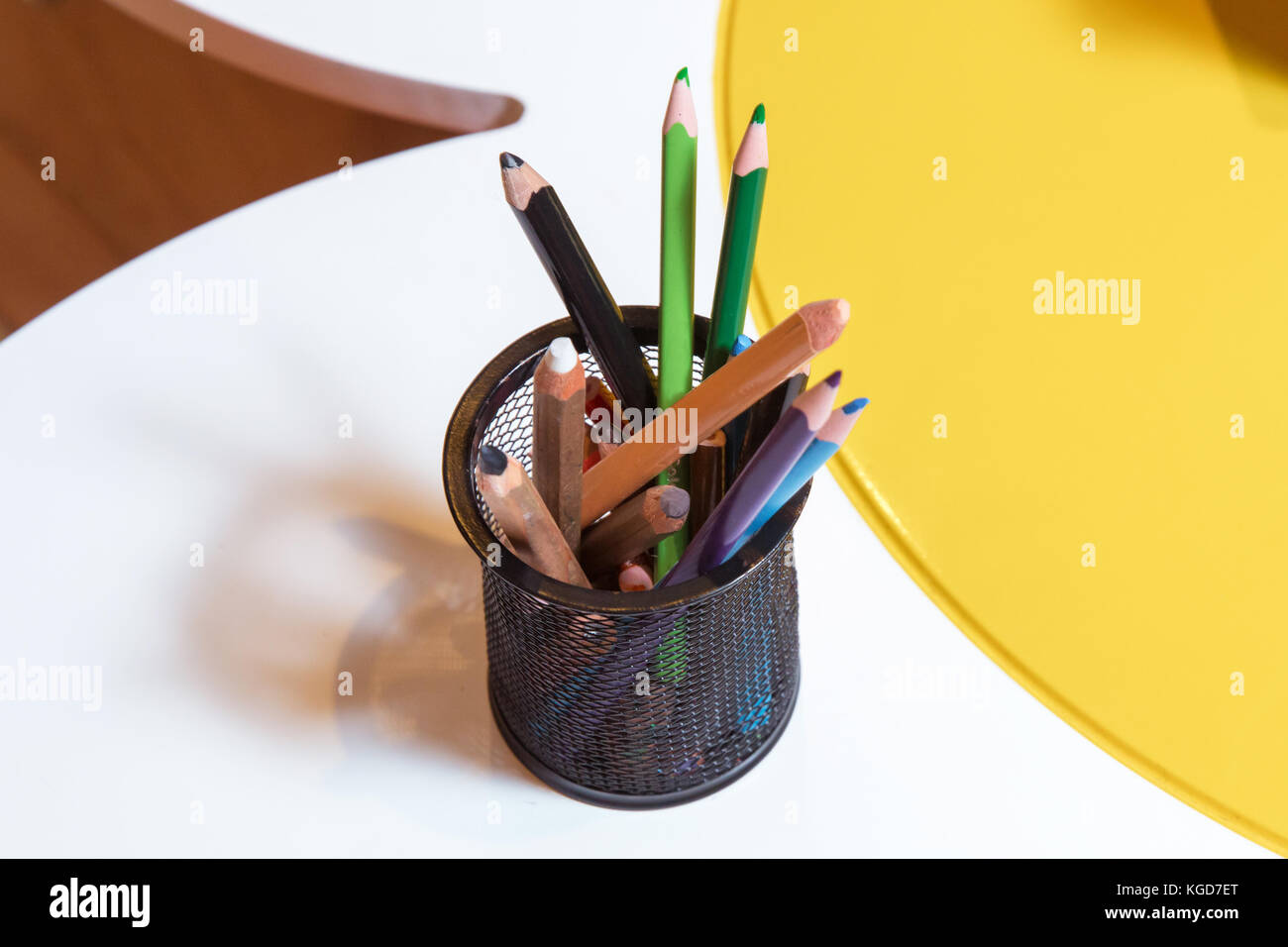 Crayons in a bowl . Color pencils for the drawing, located in a support ...