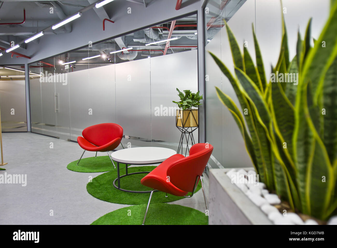 A luxurious sitting area in a small office with a modern interior ...