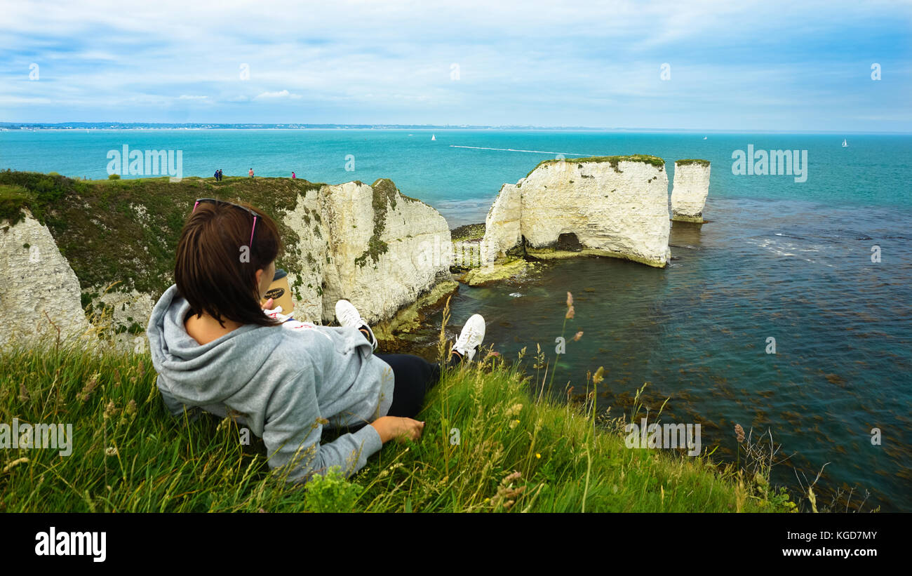 Woman in Old Harry Rocks Stock Photo - Alamy