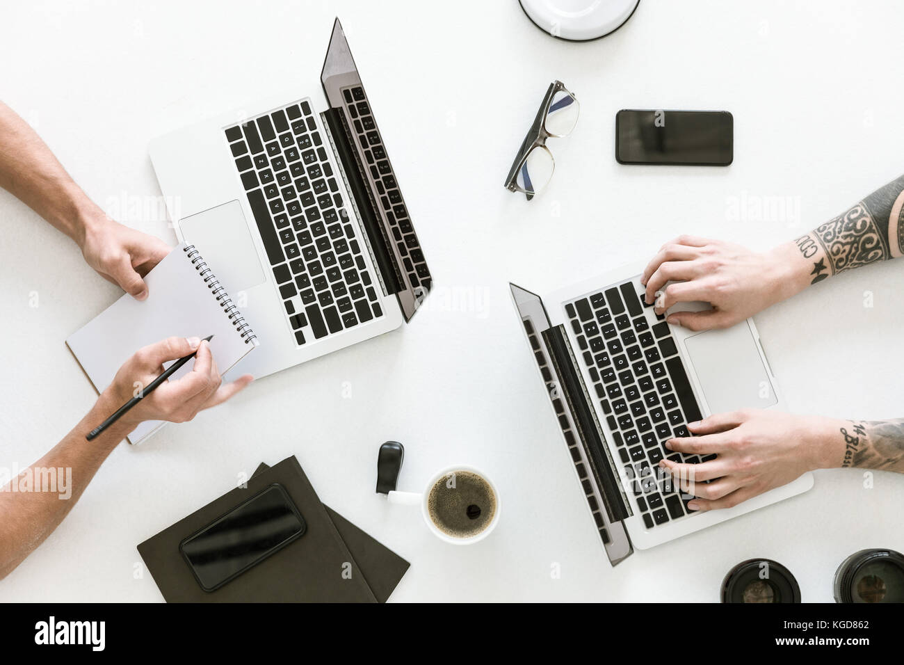 Two men working on laptops Stock Photo - Alamy Two men working on laptops Stock Photo - Alamy