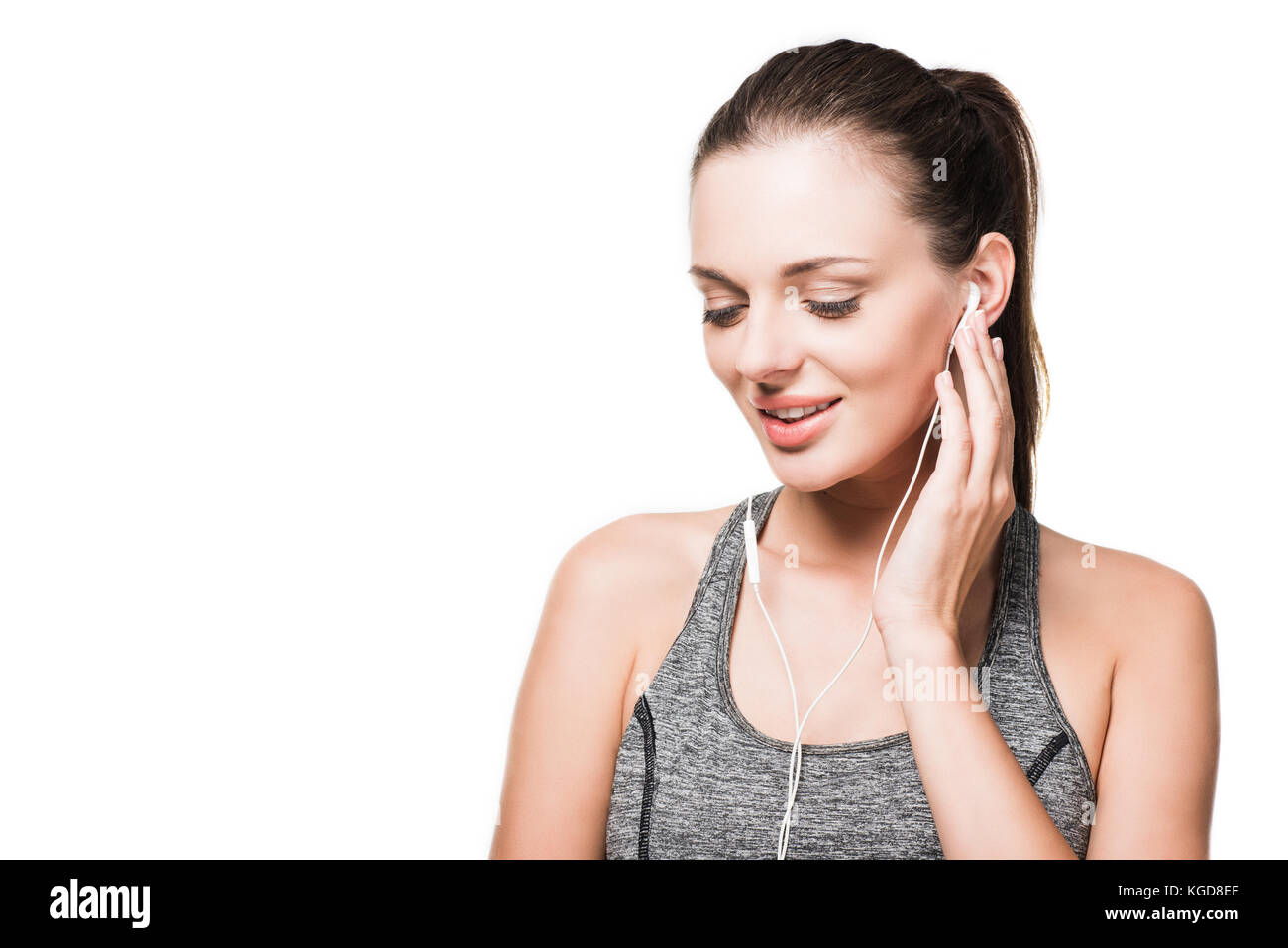 young woman in earphones Stock Photo - Alamy