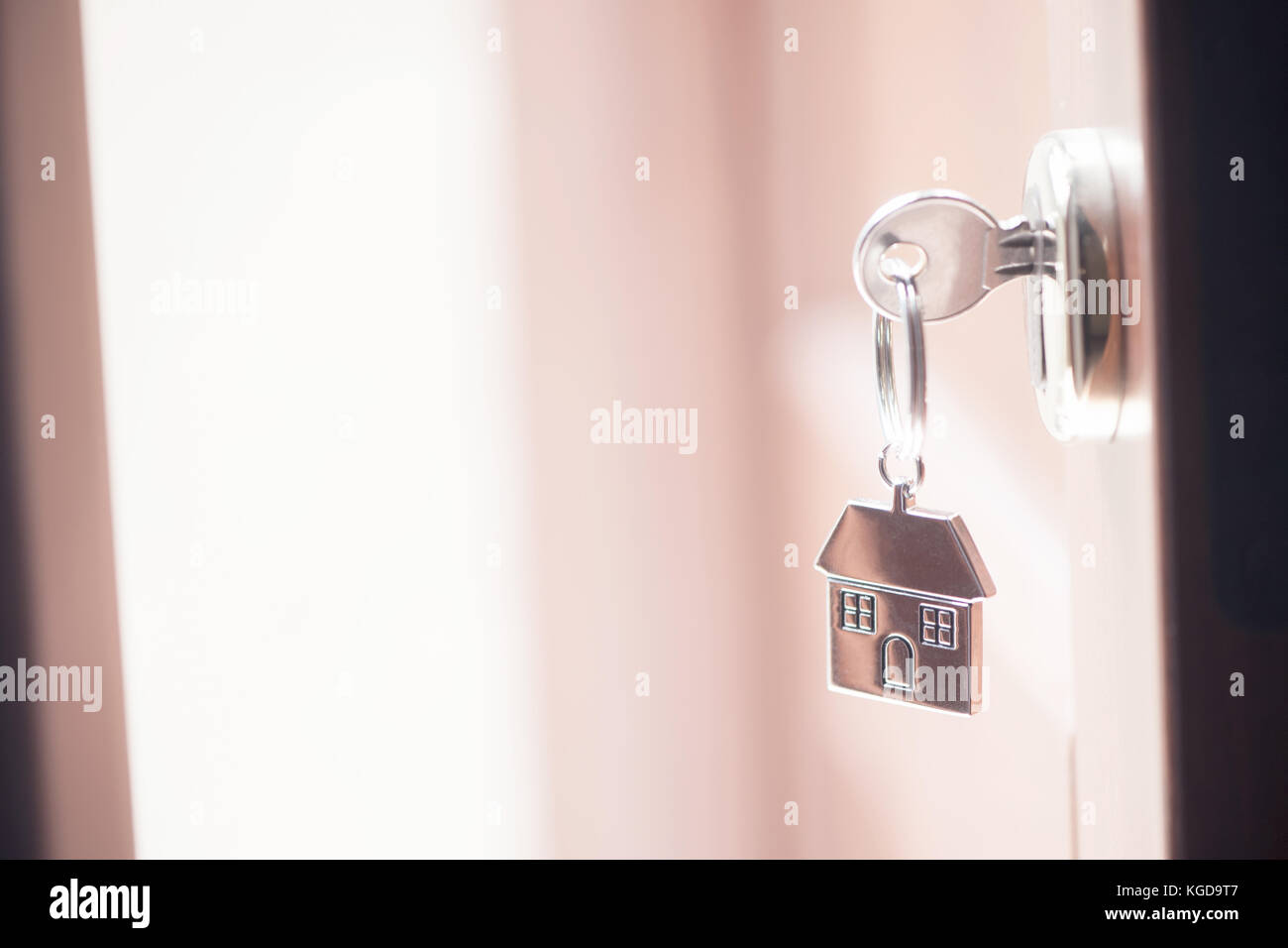 House key in the door Stock Photo - Alamy