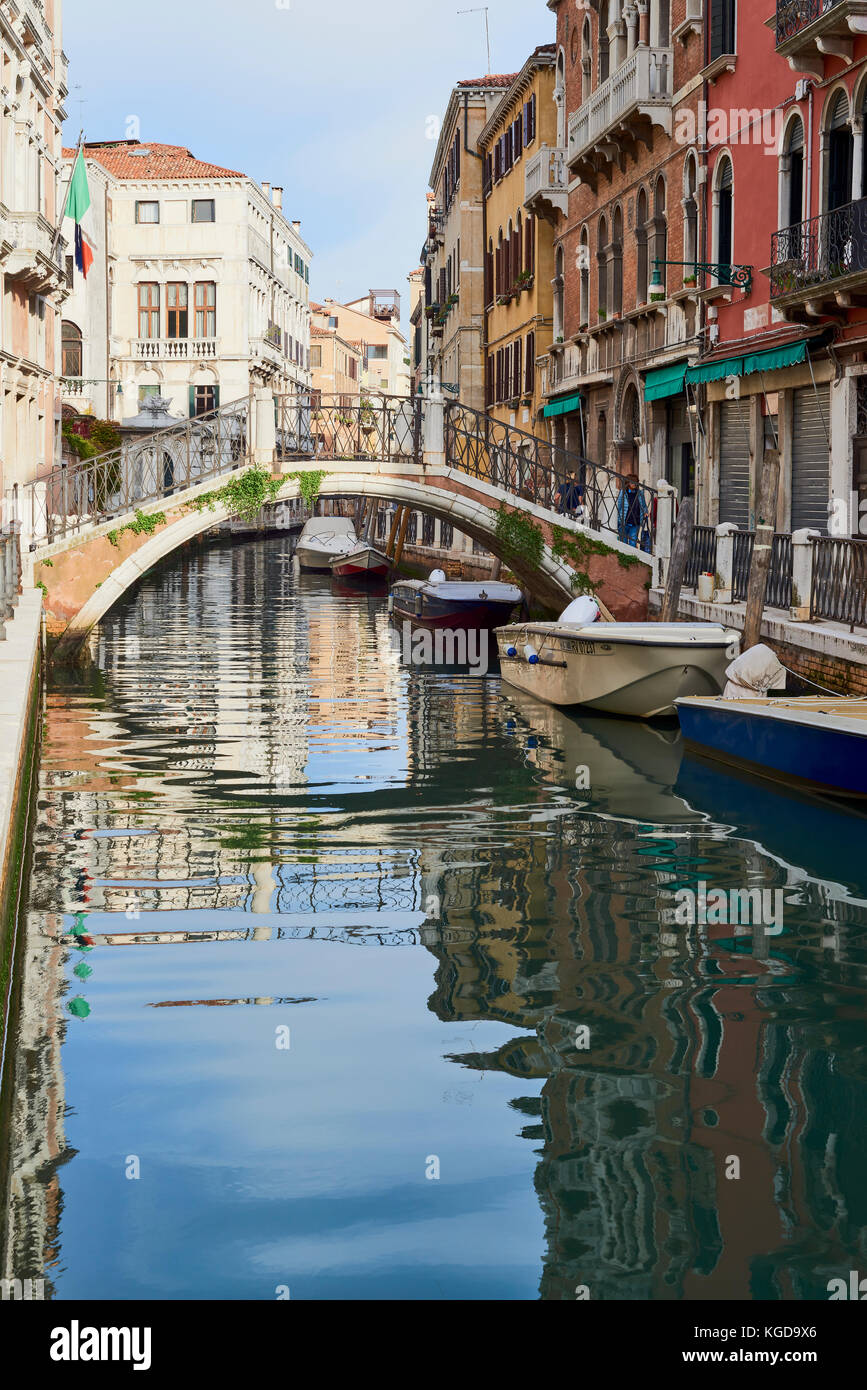 Boats docked in small canal in Venice, Italy Stock Photo - Alamy