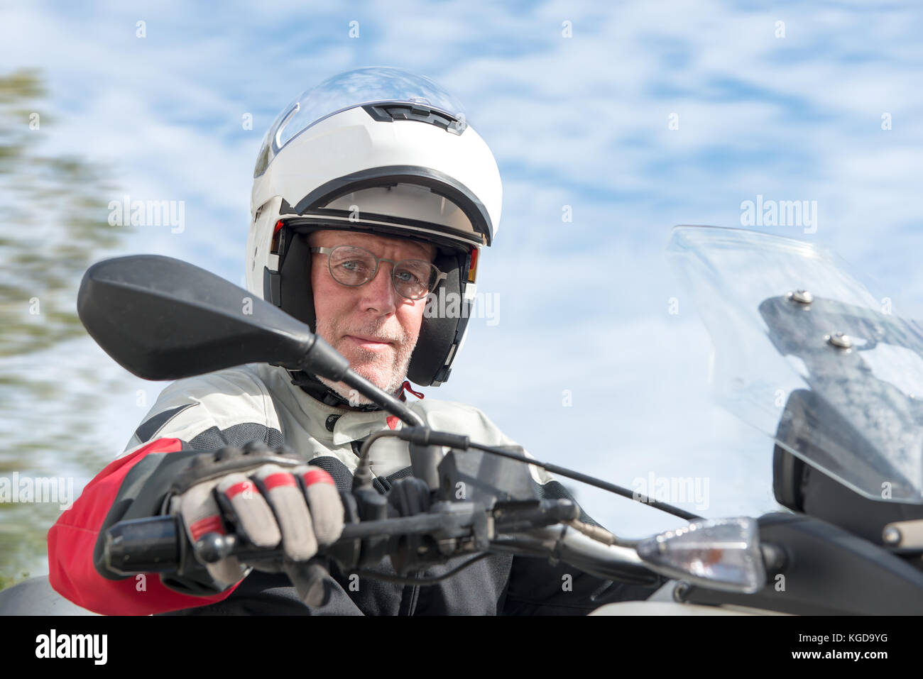 portrait of a senior biker on his motorcycle Stock Photo - Alamy