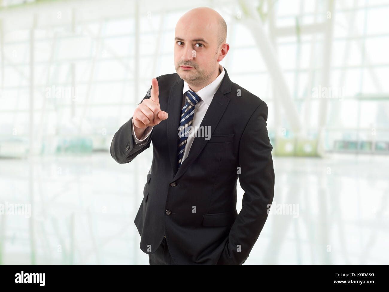 mad business man pointing, at the office Stock Photo - Alamy