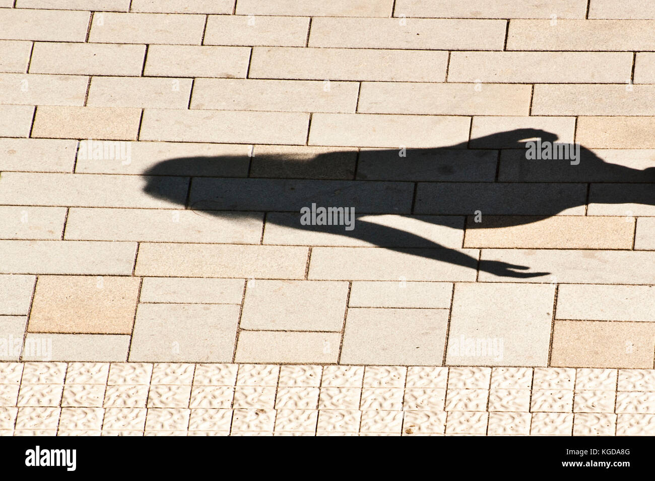 shadow of a woman on the street Stock Photo - Alamy