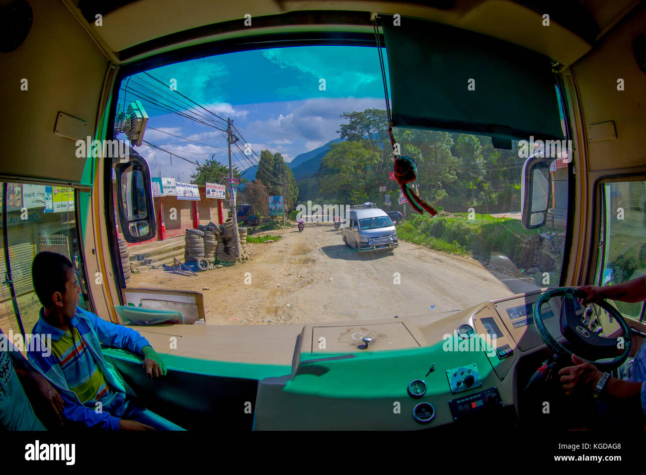 POKHARA, NEPAL OCTOBER 10, 2017: Close up of a bus driver from the ...
