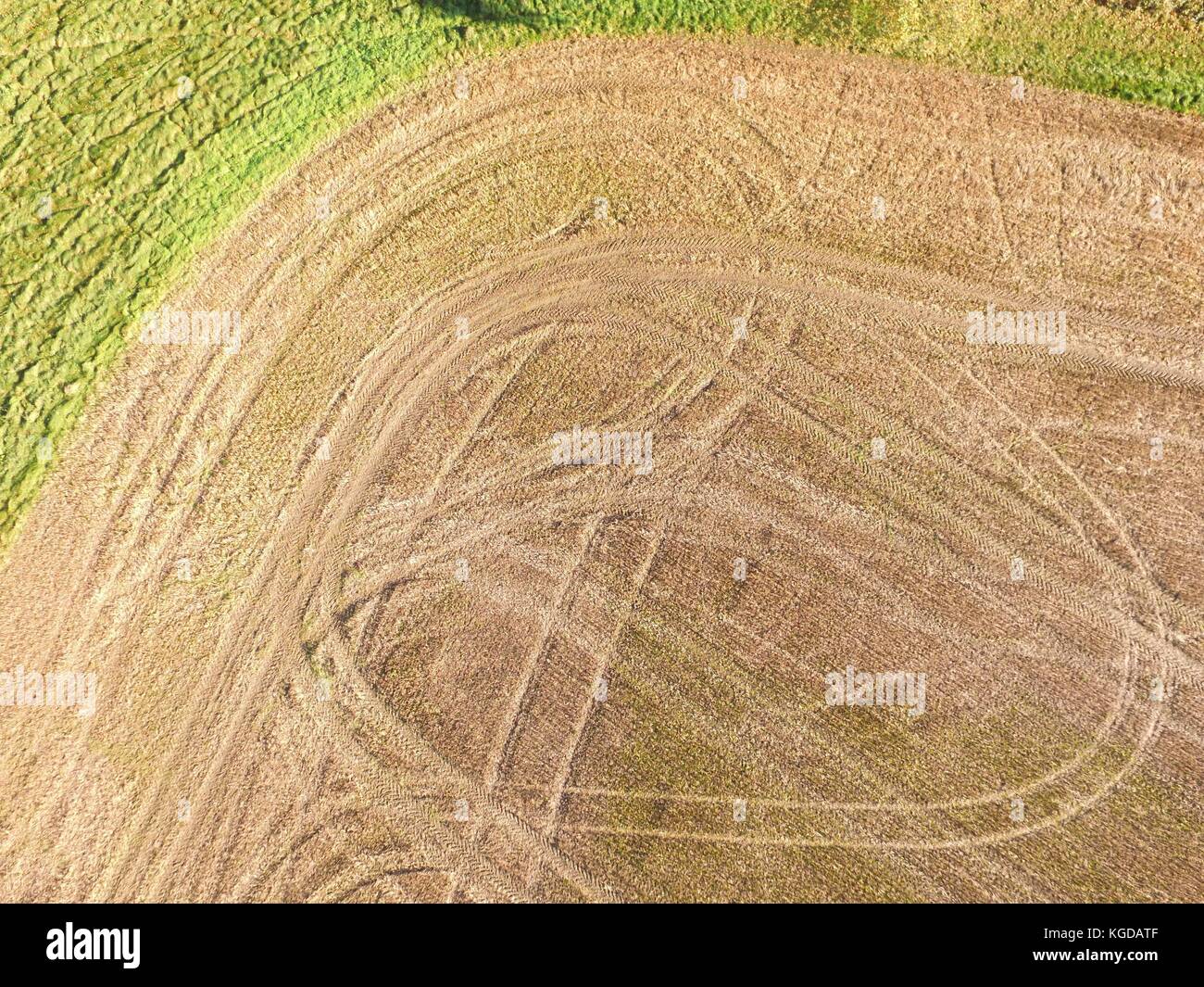 Drone still image at a height of 200ft of tractor tracks in a farm ...