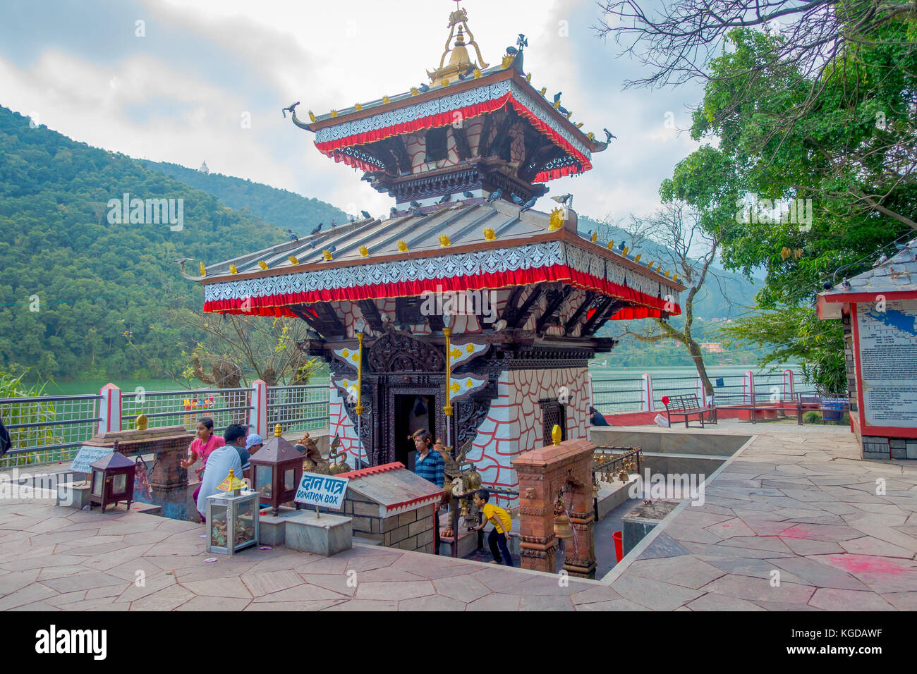 POKHARA, NEPAL - SEPTEMBER 04, 2017: Unidentified people walking around ...