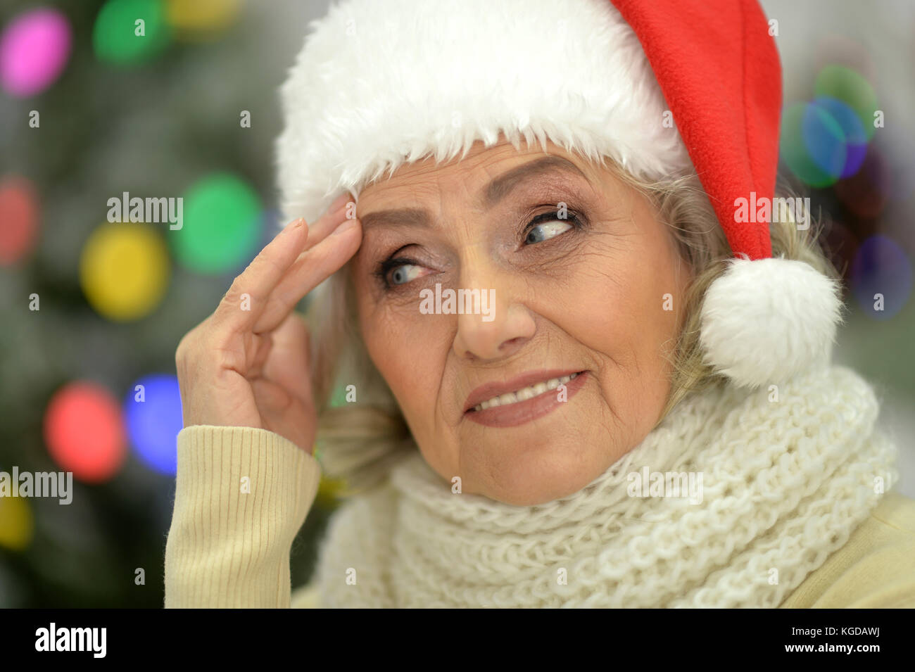 Old lady santa hat hi-res stock photography and images - Alamy