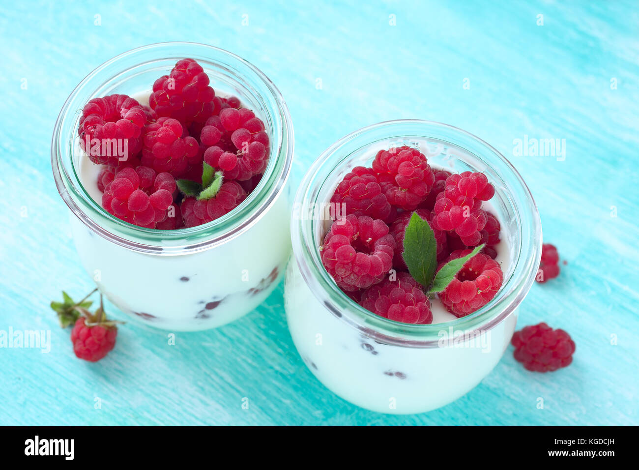 Yogurt with raspberry Stock Photo - Alamy