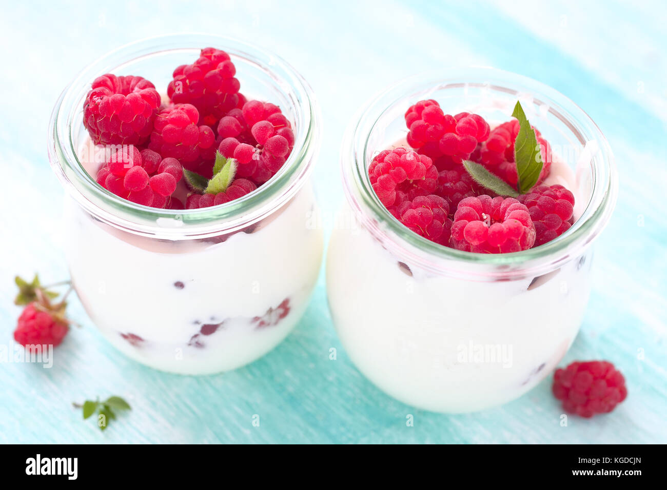 Yogurt with raspberry Stock Photo - Alamy