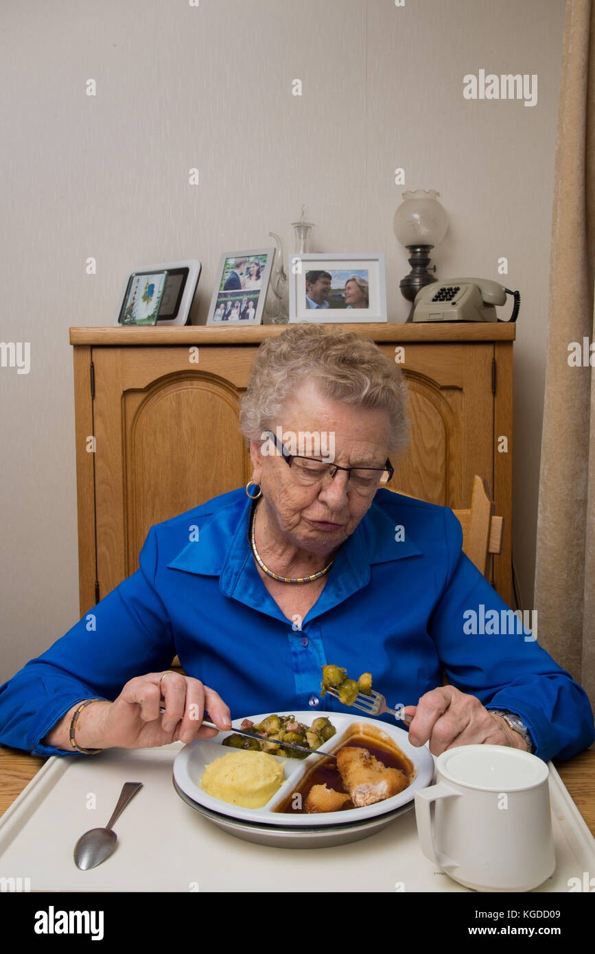 portrait of eating old woman Stock Photo - Alamy