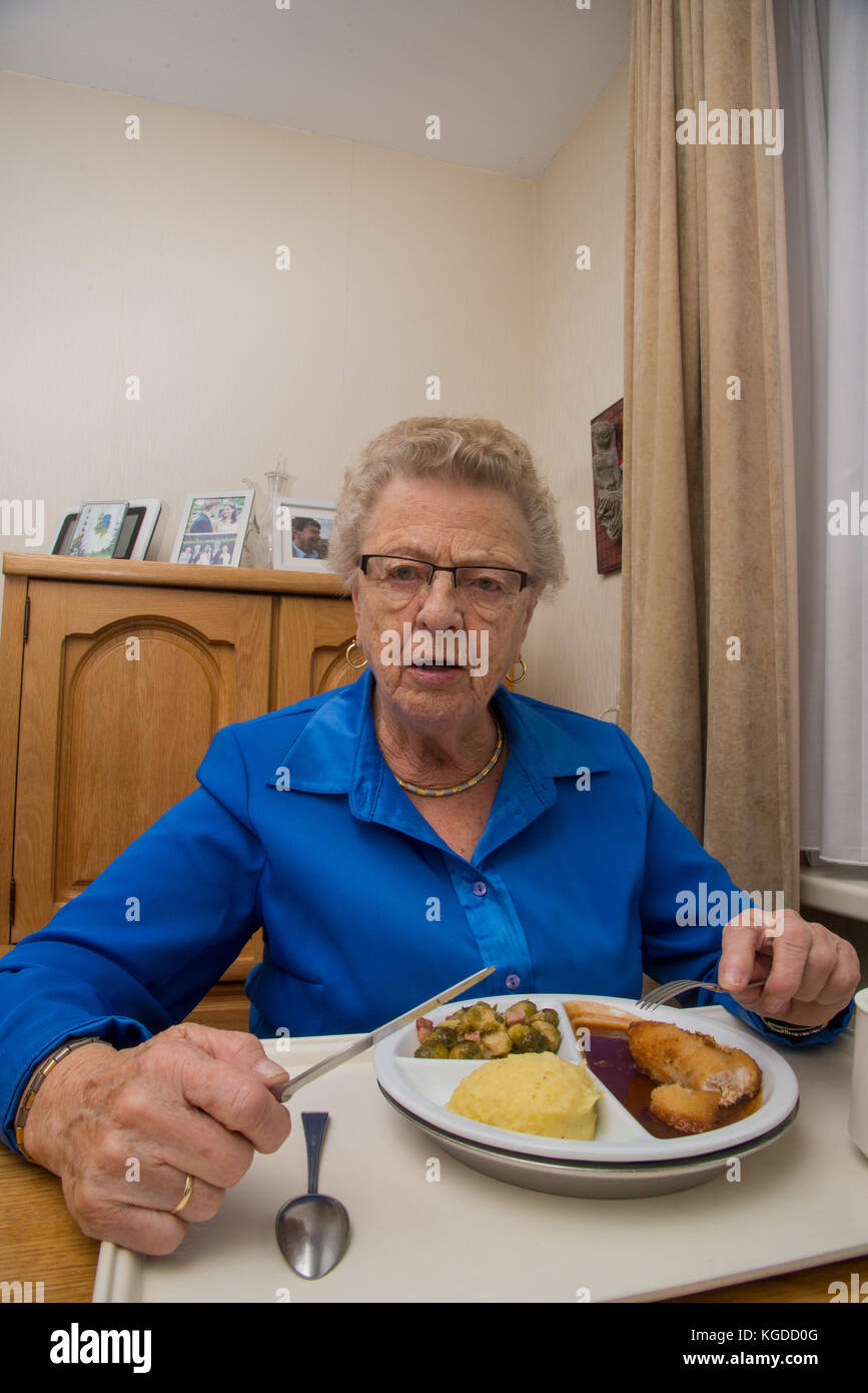 portrait of eating old woman Stock Photo - Alamy