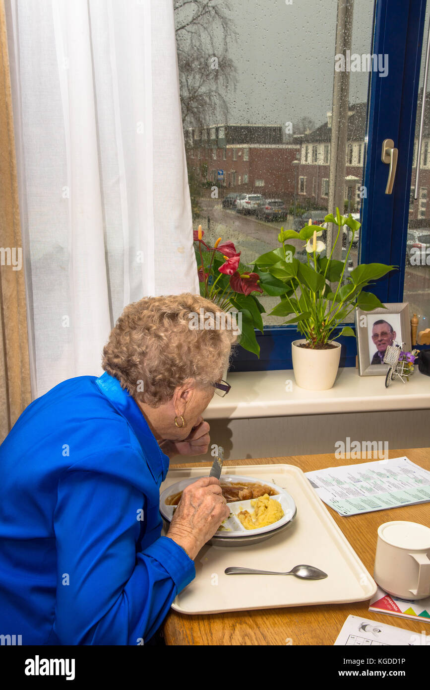 portrait of eating old woman Stock Photo - Alamy