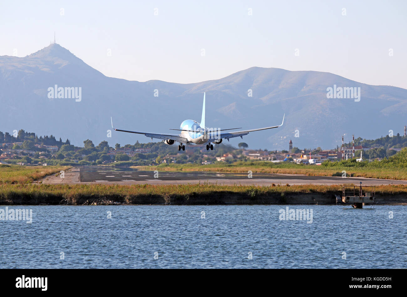 airplane landing on Corfu airport Stock Photo - Alamy