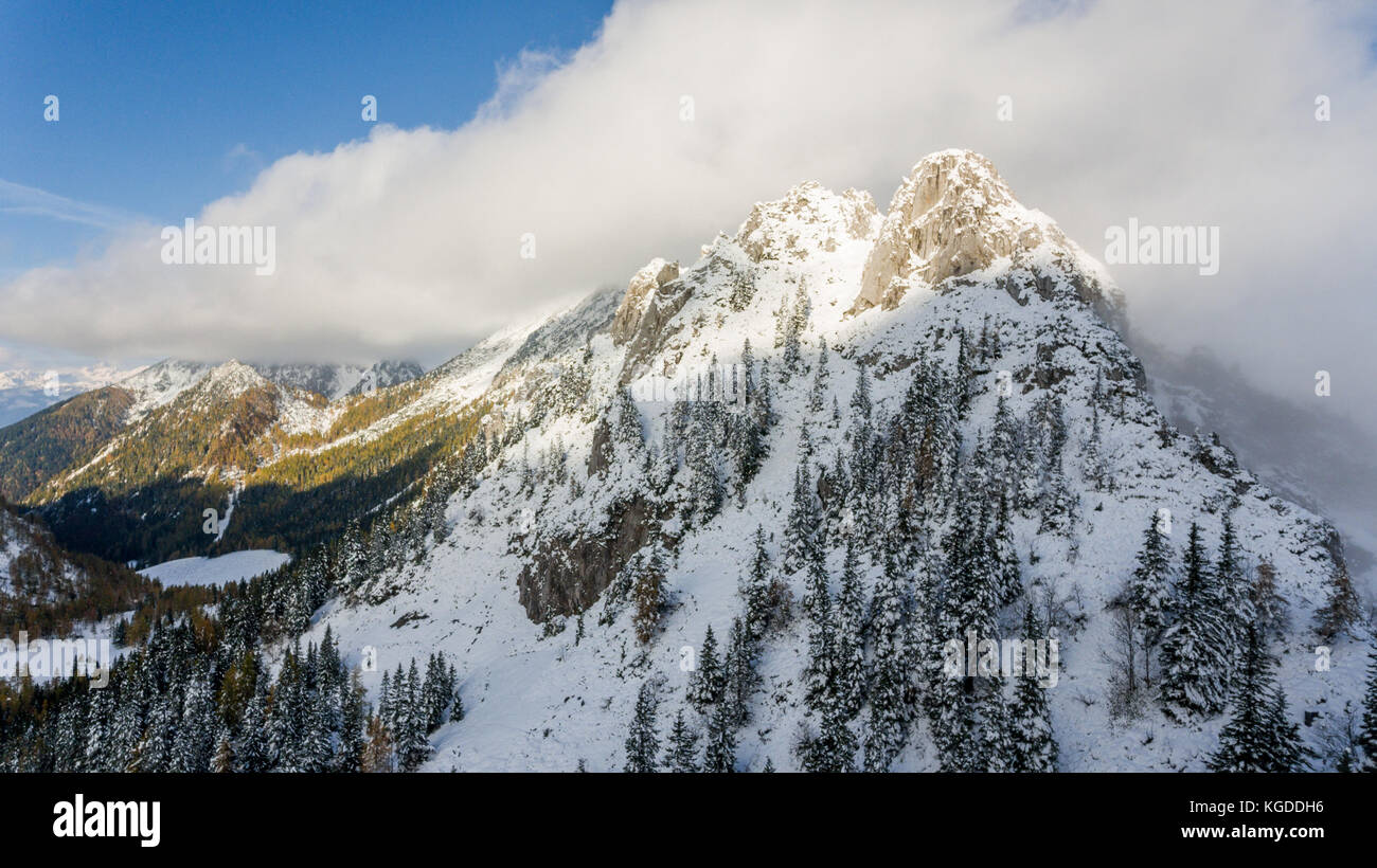 First snow covering mountain top Stock Photo - Alamy