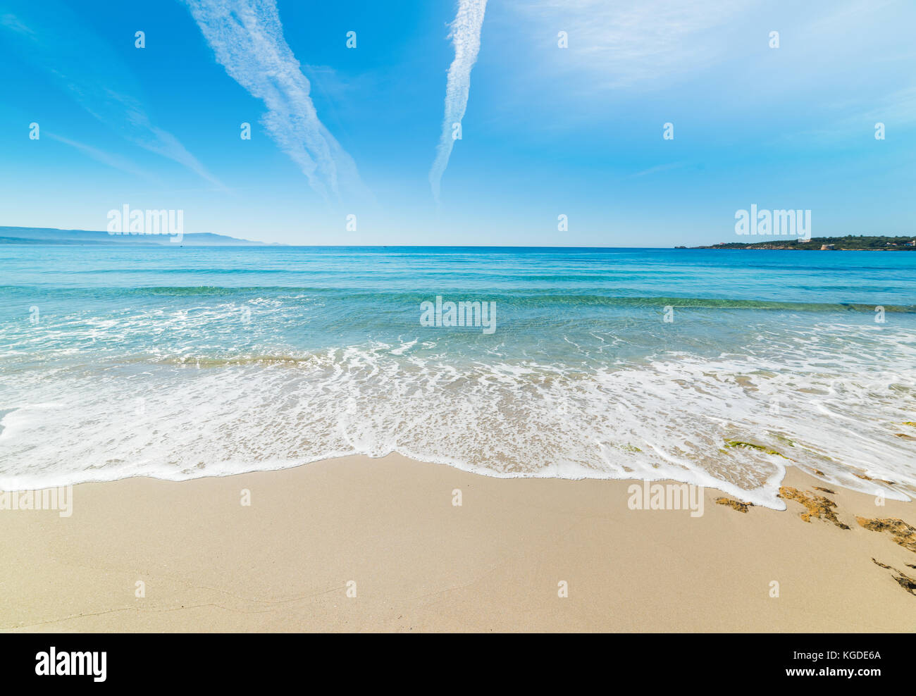 clear blue sky over Le Bombarde beach, Sardinia Stock Photo - Alamy