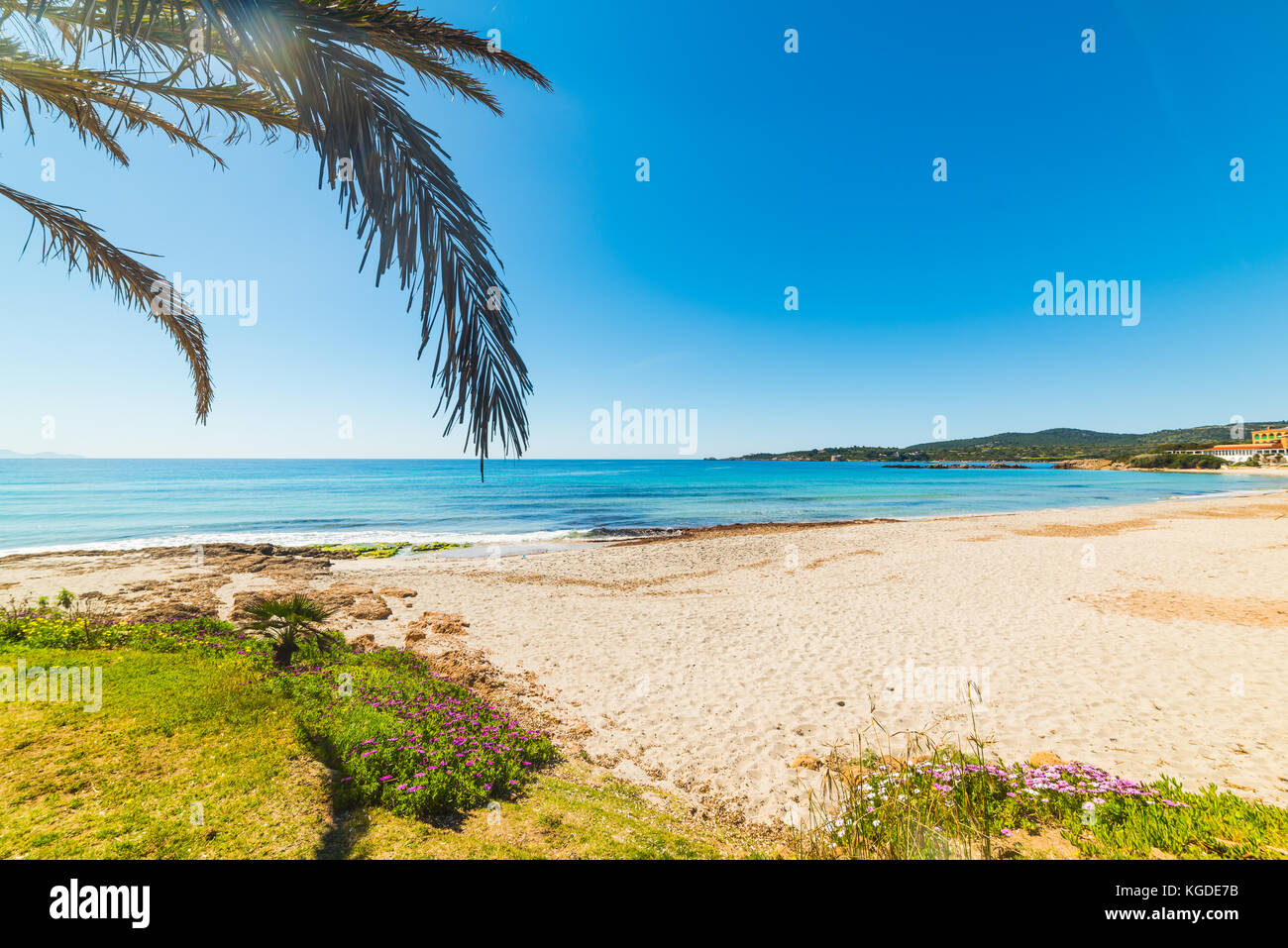 clear blue sky over Le Bombarde beach, Sardinia Stock Photo - Alamy