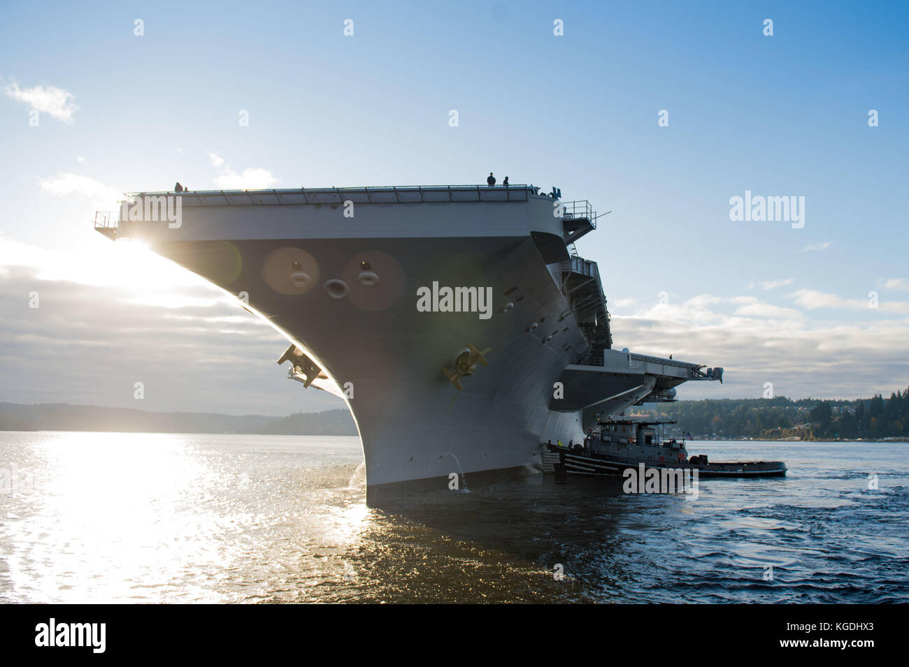 The Nimitz-class aircraft carrier USS John C. Stennis (CVN 74) transits Puget Sound. John C ...