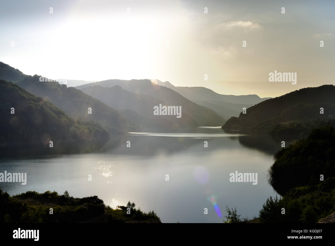 Panoramic view over the lake between the mountains at sunset Stock ...
