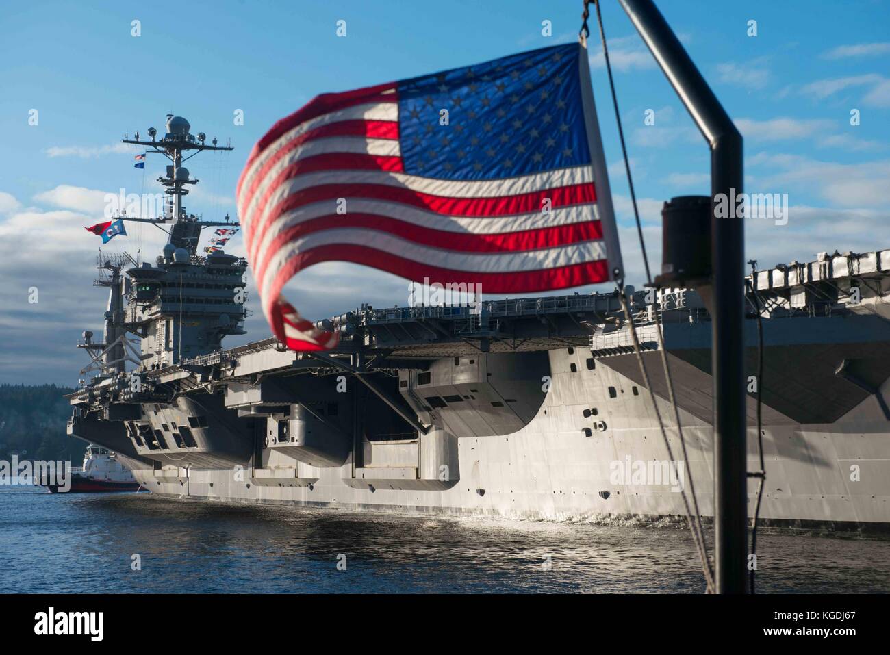 The Nimitz-class aircraft carrier USS John C. Stennis (CVN 74) transits Puget Sound. John C ...