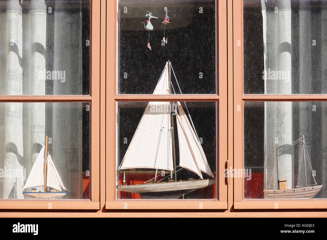 Traditional wooden window with model boats. Vintage background ...