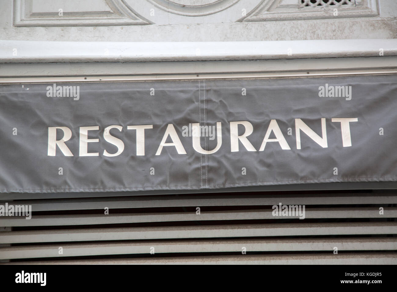 Restaurant Sign on Building Facade Stock Photo - Alamy