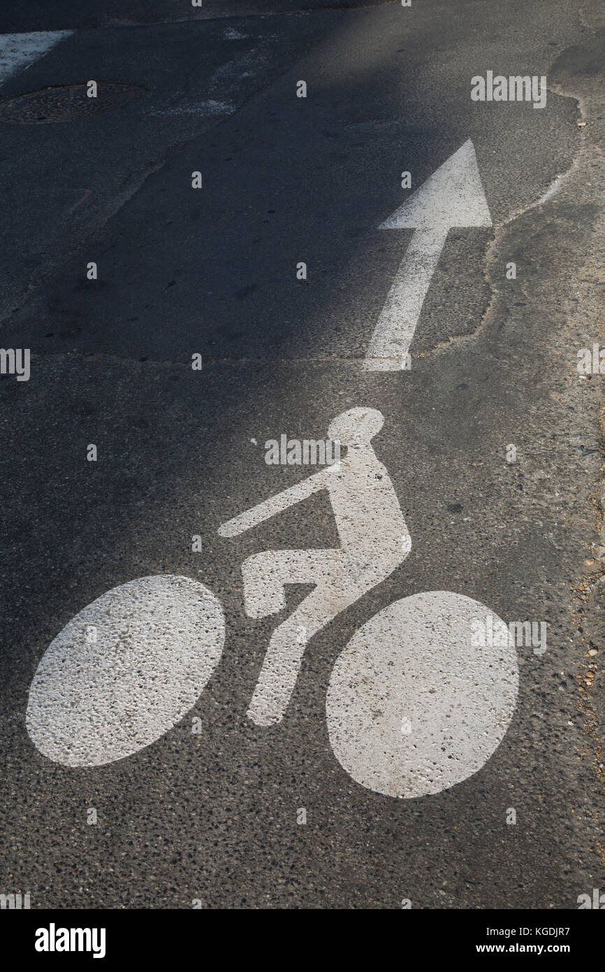 Bike Lane Symbol on Road Surface Stock Photo - Alamy
