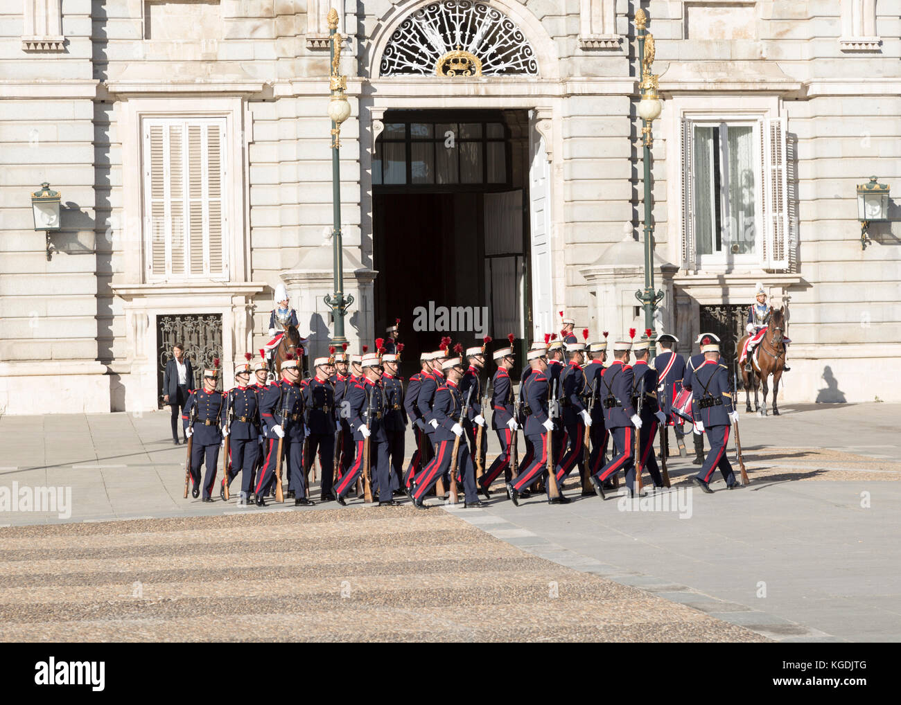 Marching soldiers in traditional dress uniform, Palacio Real royal ...