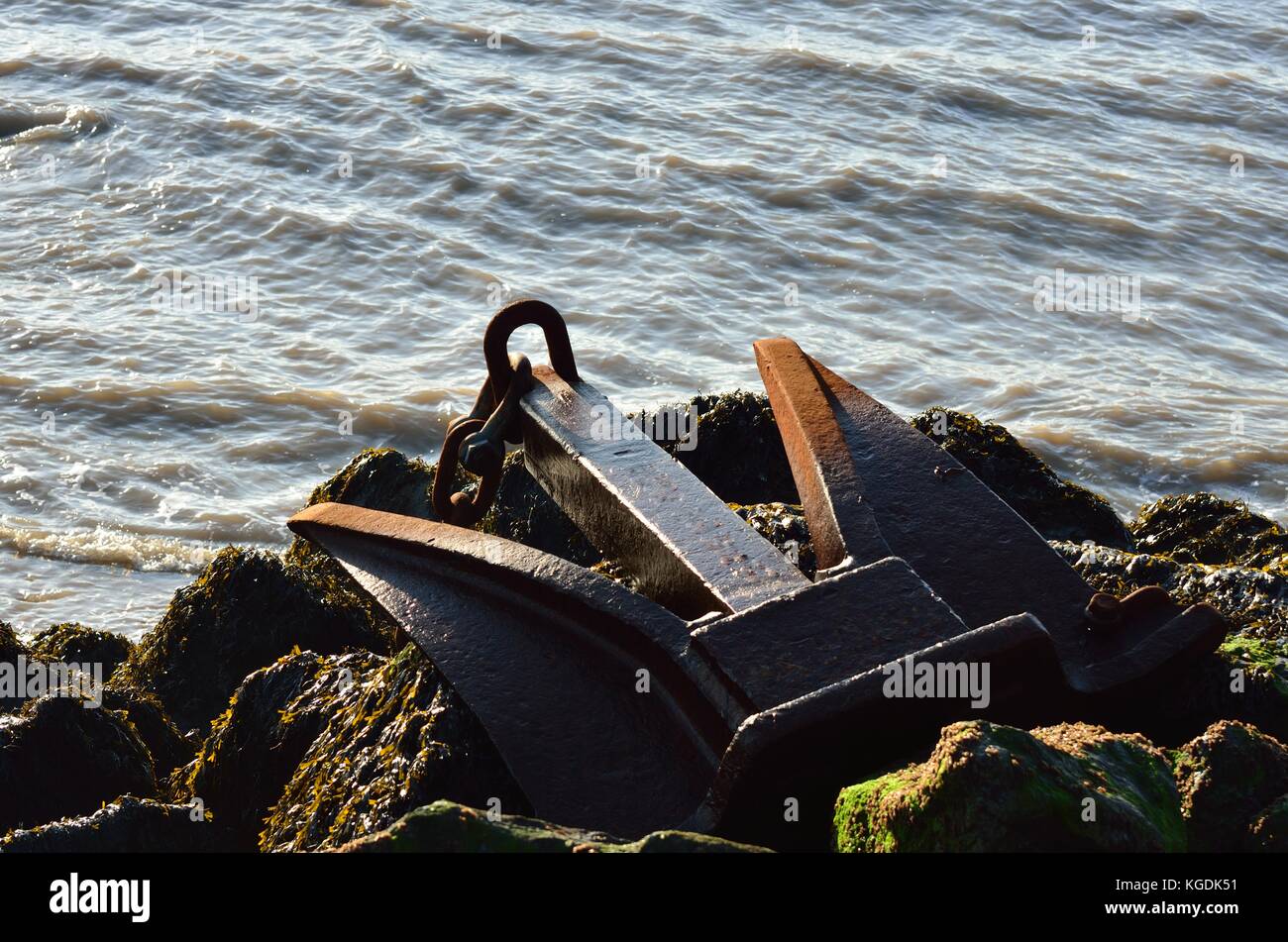 Close up of anchor on rocks Stock Photo - Alamy