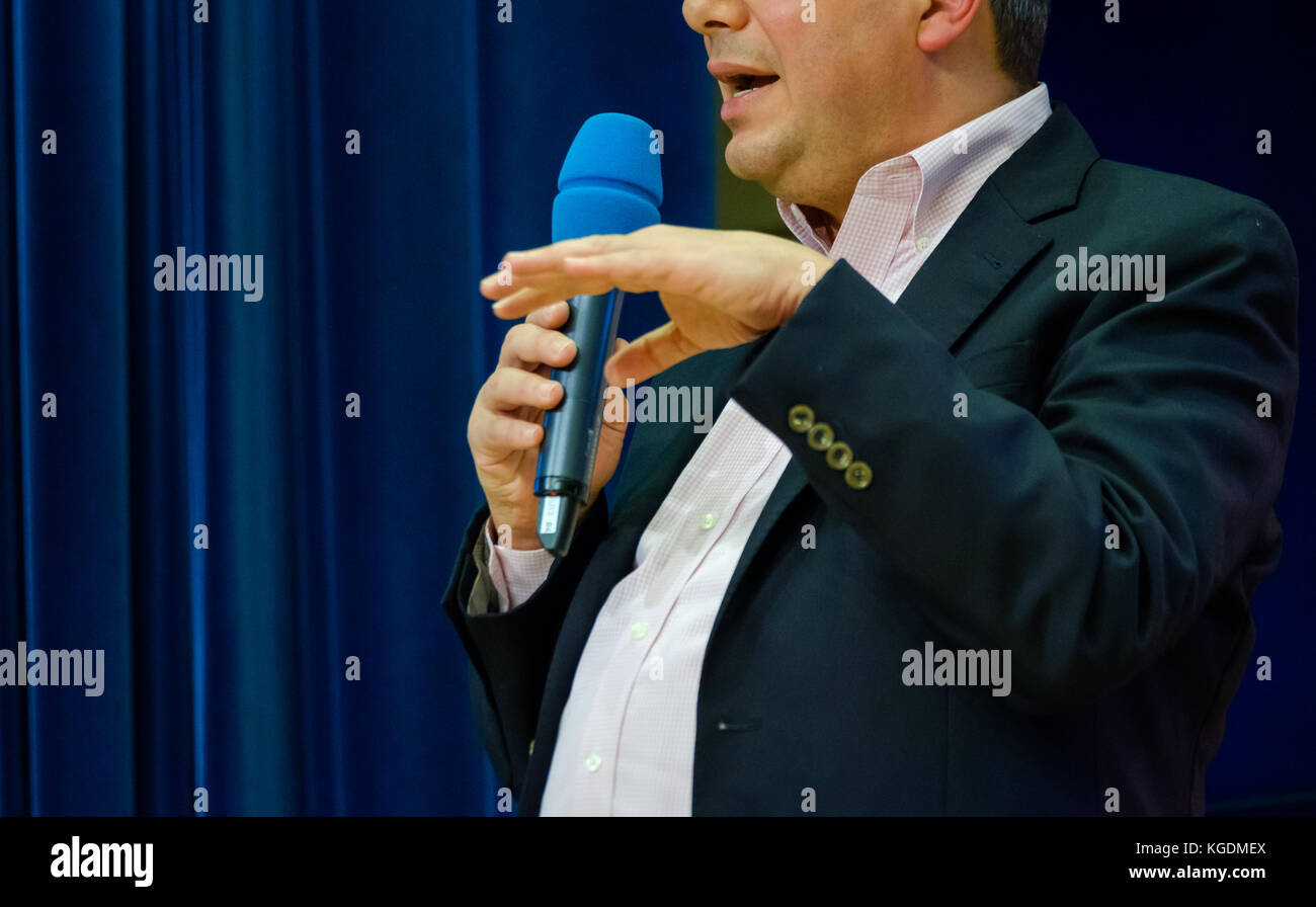 Man speaking at a conference Stock Photo - Alamy
