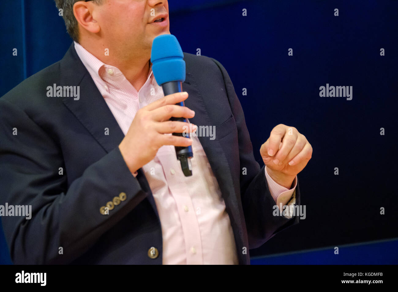 Man speaking at a conference Stock Photo - Alamy