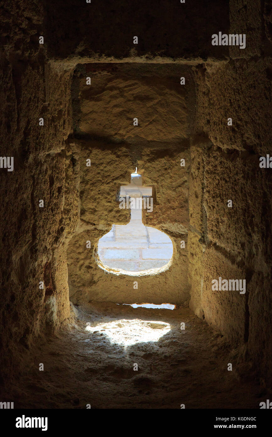 Inverted keyhole embrasure at the medieval Moorish Alcazaba (citadel ...