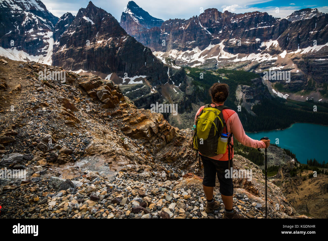 Hiker overlooking Lake O'Hara from Huber Ledges Stock Photo - Alamy