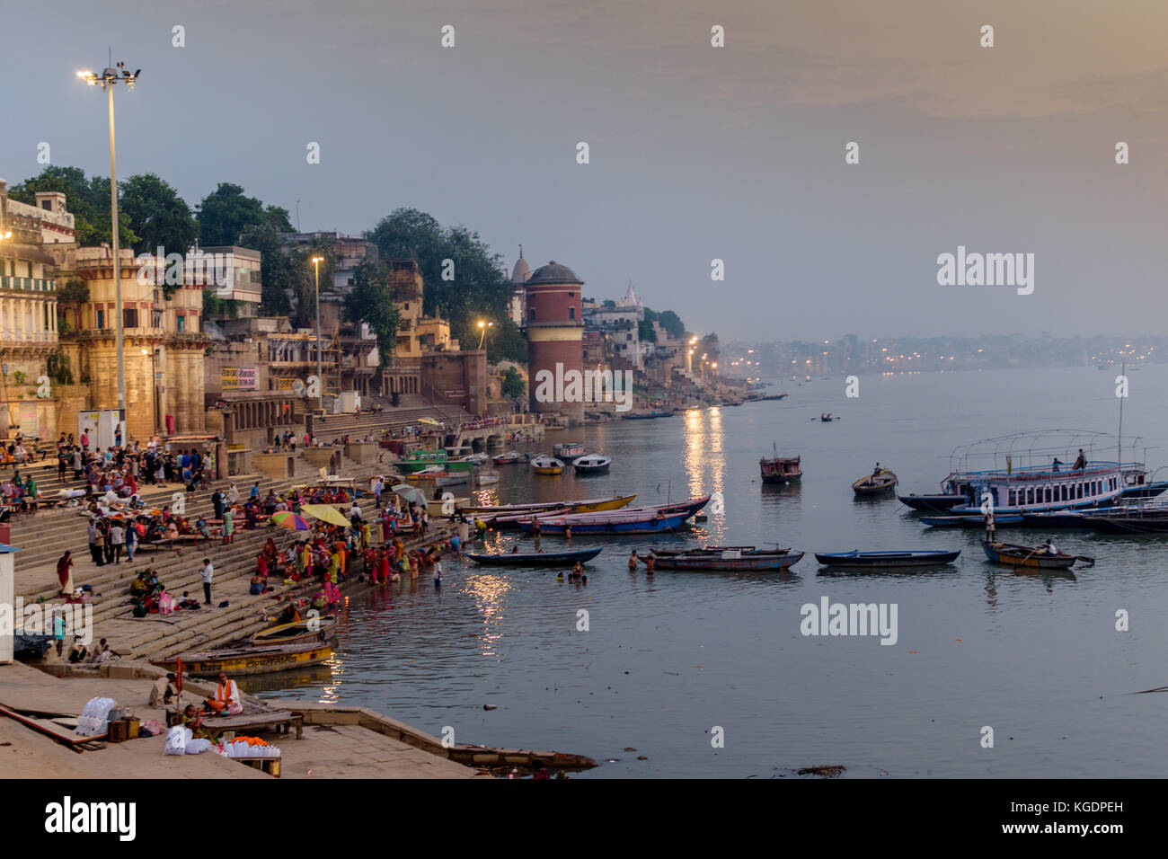 A view from River Ganges of Old Historical Varanasi city with weathered ...