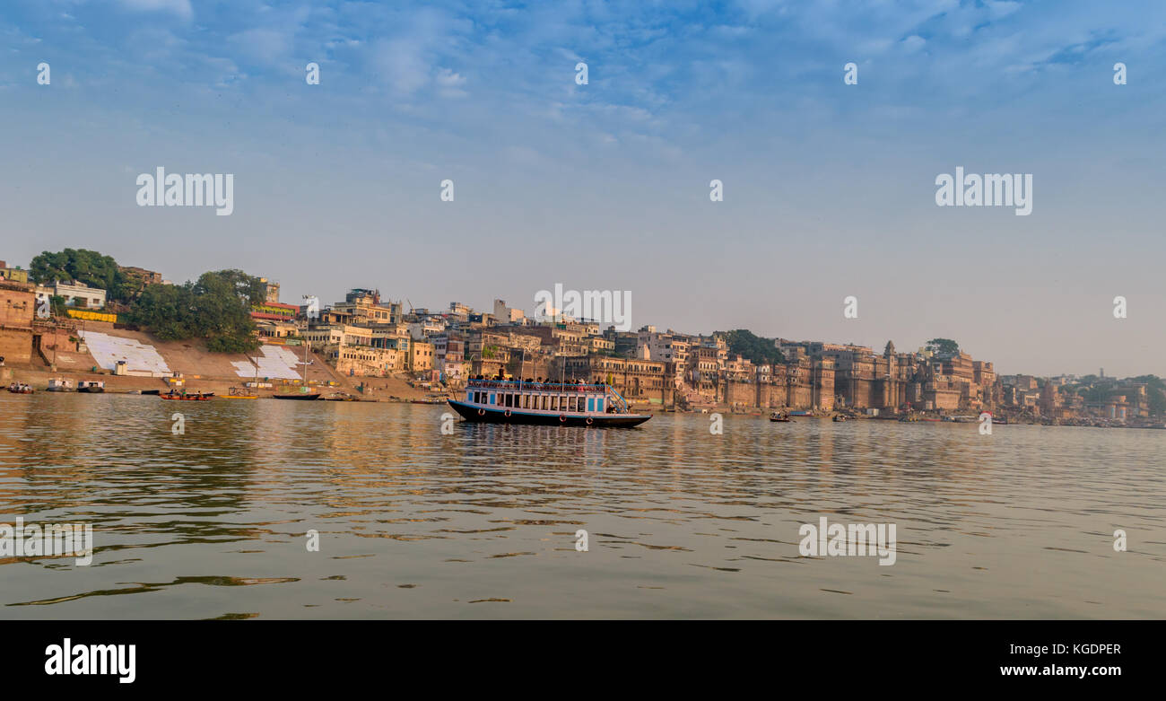A view from River Ganges of Old Historical Varanasi city with weathered ...