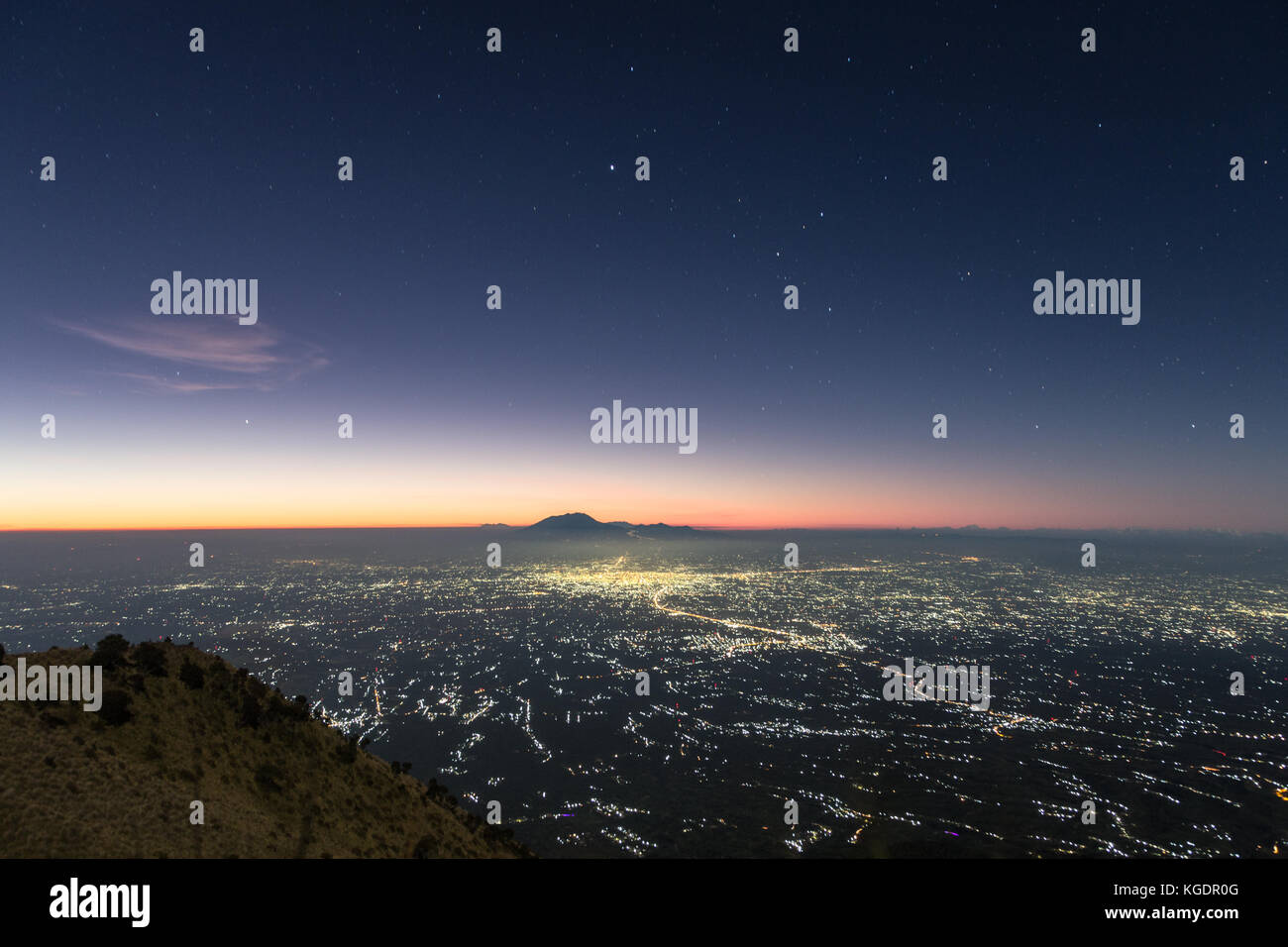 Sunrise from the summit of Merbabu volcano over the plain of Yogjakarta ...