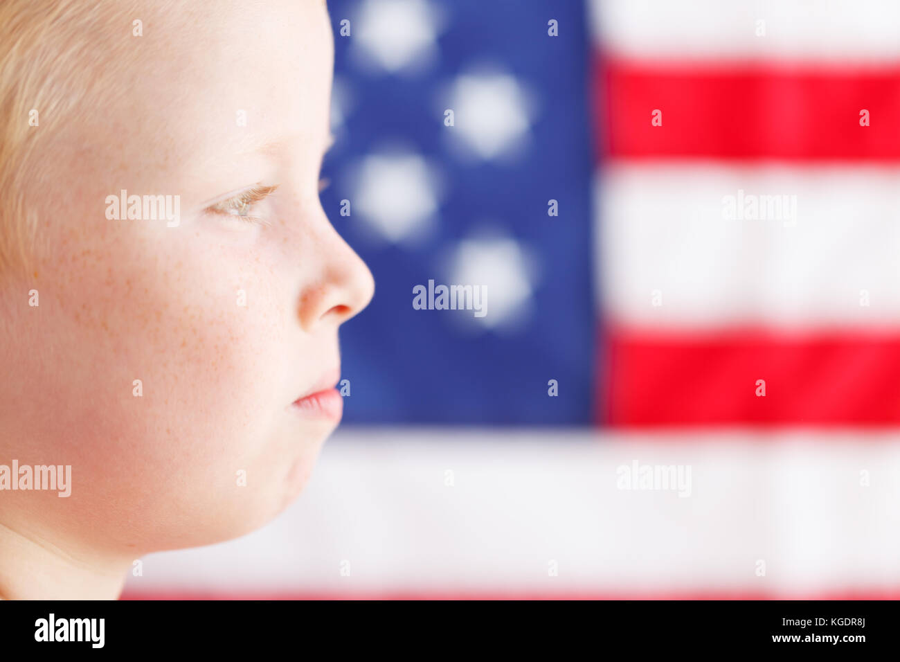 American little boy with American flag on a background Stock Photo - Alamy