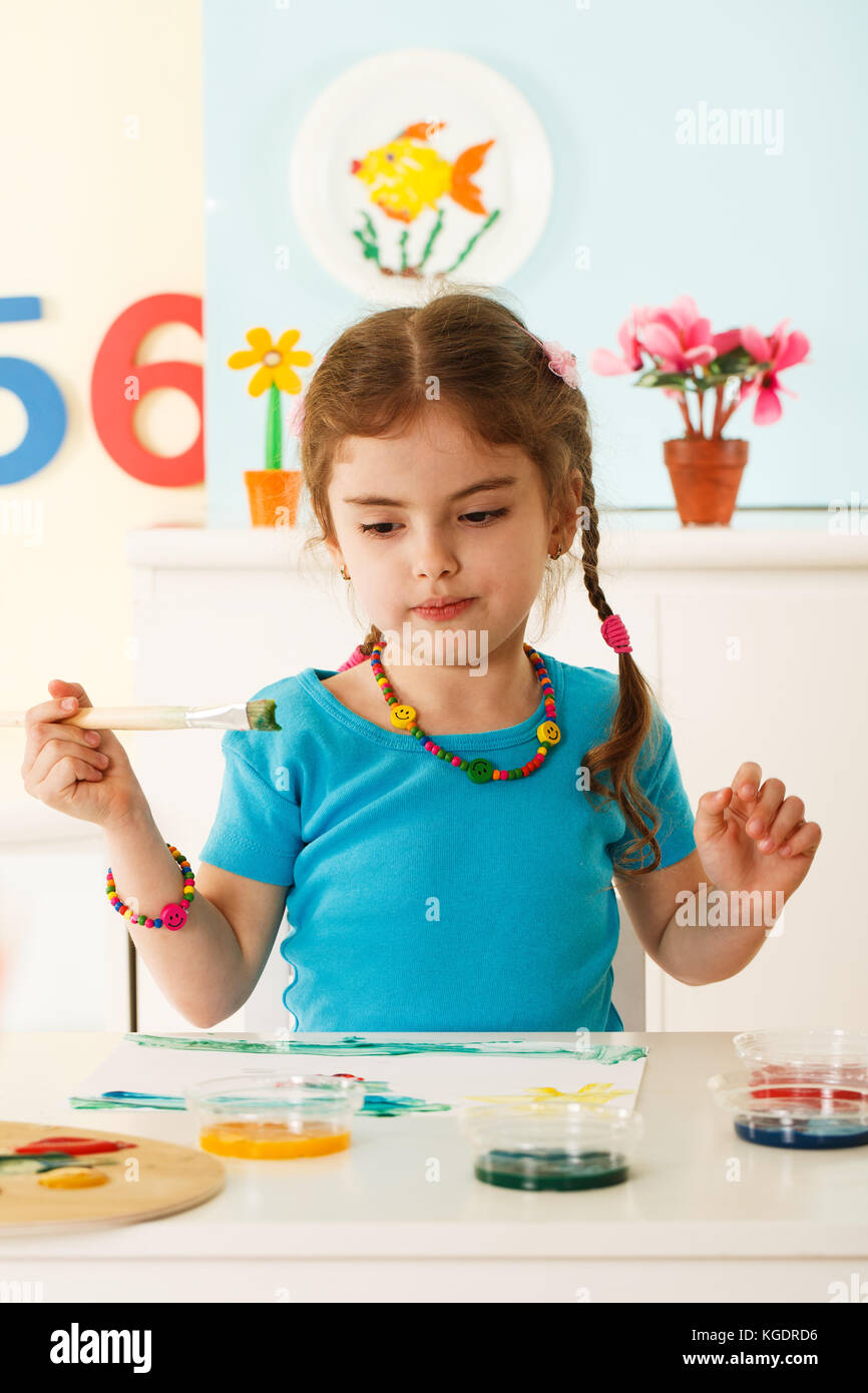 Preschool girl drawing Stock Photo - Alamy