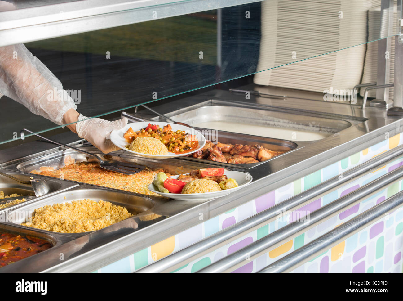 chef standing behind full lunch service station Stock Photo - Alamy